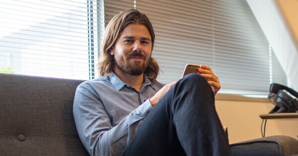 Seattle CEO who cut his pay so workers could earn $70K resigns